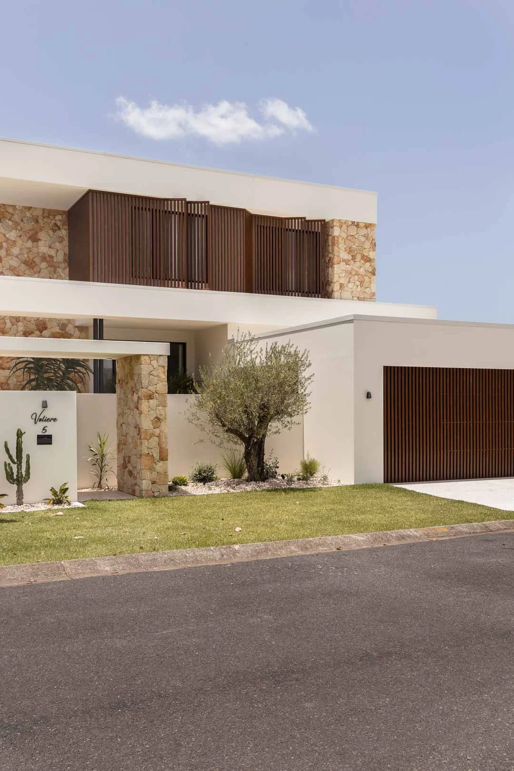 Inspired by Modern Spanish Architecture, Volière is an Entertainer’s ...